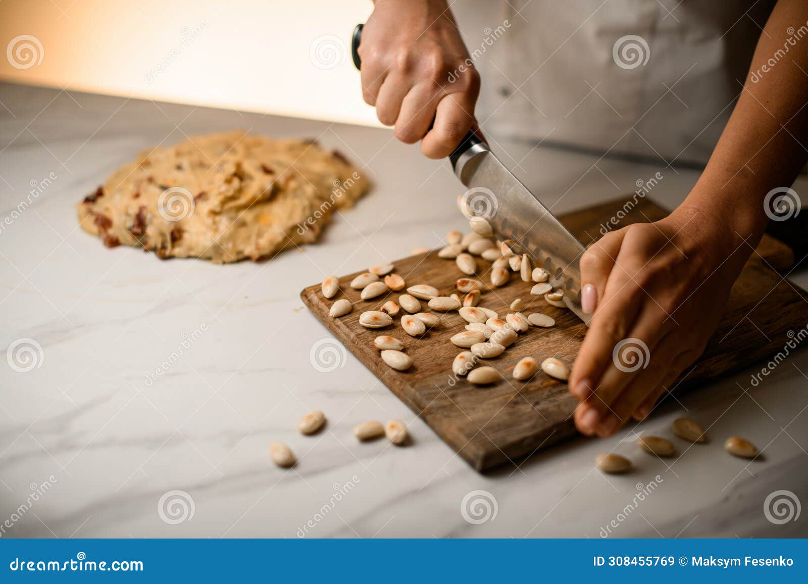 Cook Cuts Peanuts on a Cutting Board with a Knife Stock Image - Image ...