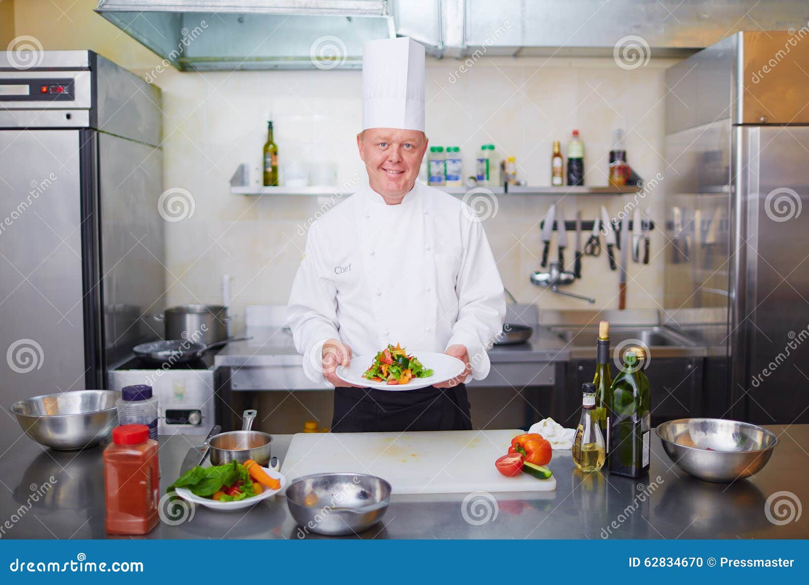 Cook with dish stock photo. Image of occupation, chef - 62834670