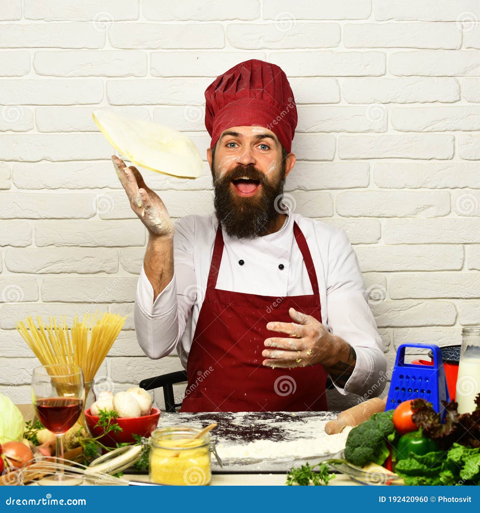 Cook with Excited Face in Uniform Sits by Table Stock Photo - Image of ...