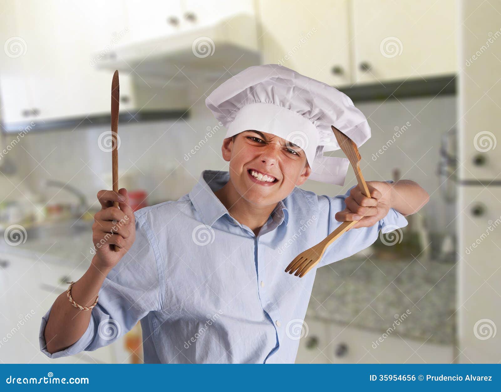 Cook fighting with spoons stock photo. Image of human - 35954656