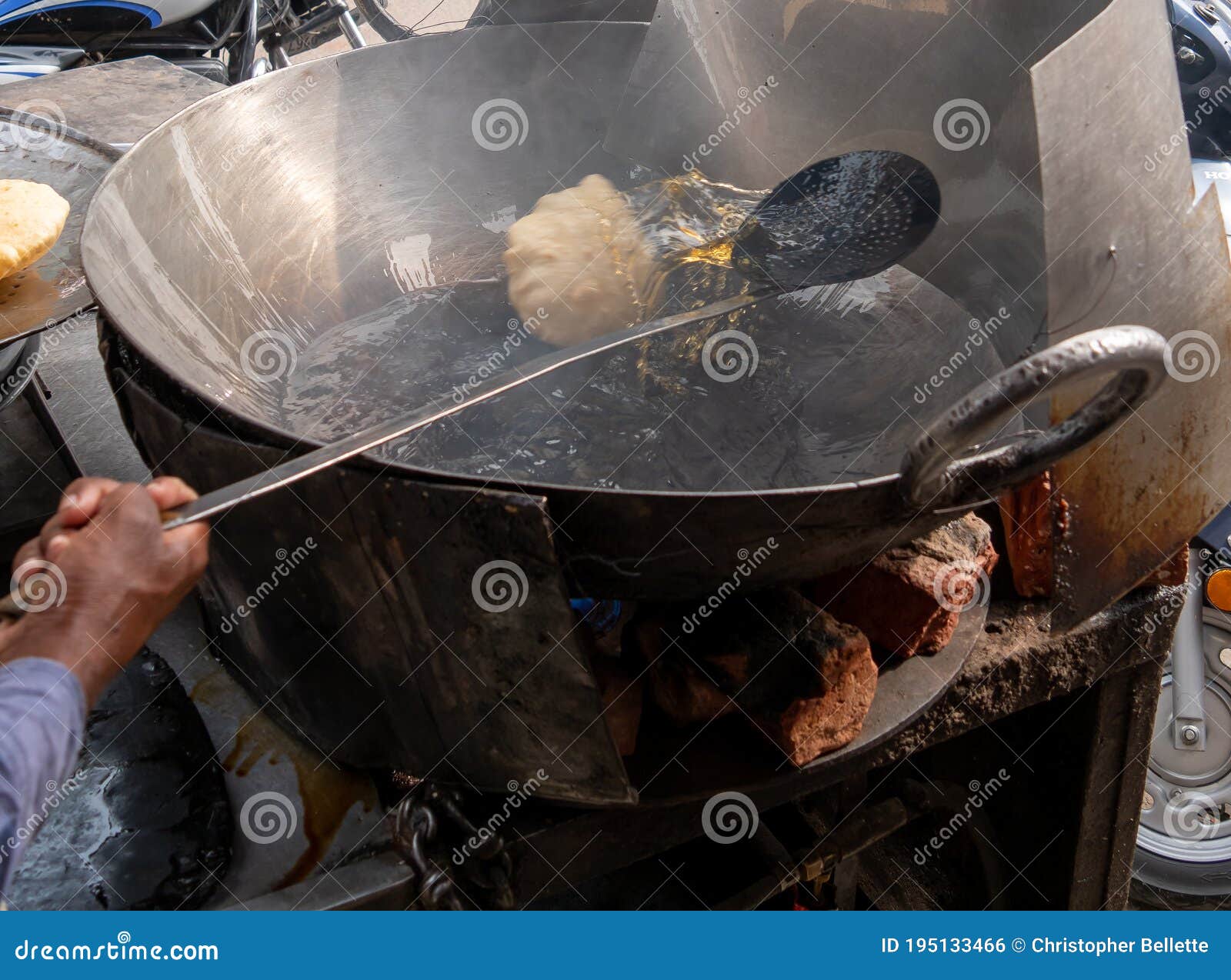 A Cook Frying Poori Bread in Amritsar Stock Photo - Image of cooking ...