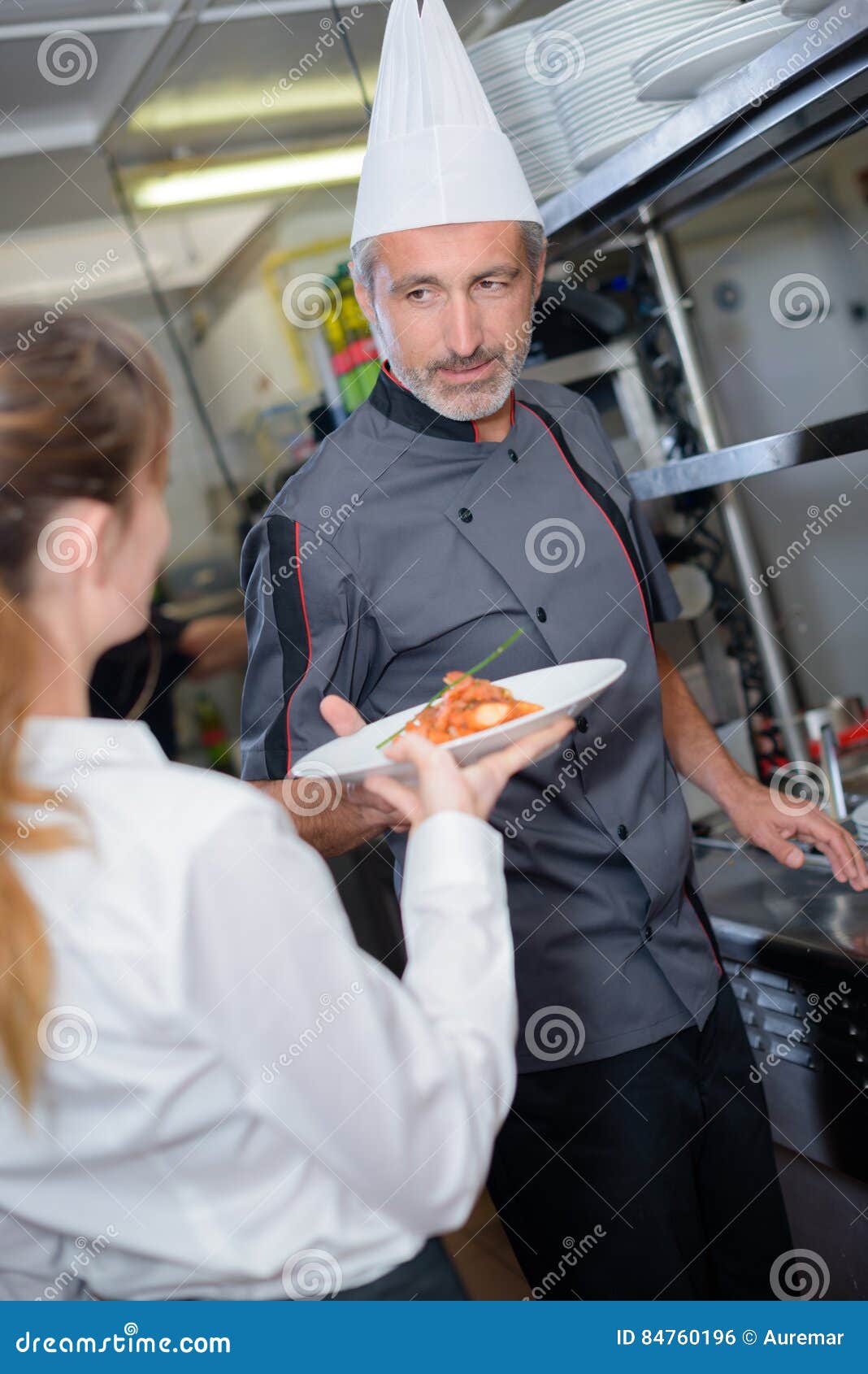 Cook giving prepared meal stock photo. Image of meal - 84760196