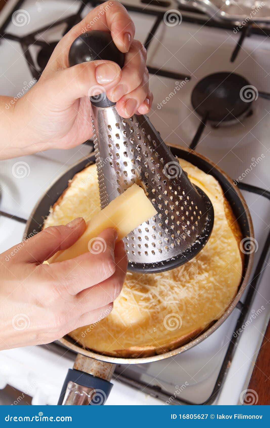 Cook Hands Grating Cheese into Omelet Stock Image - Image of heater ...