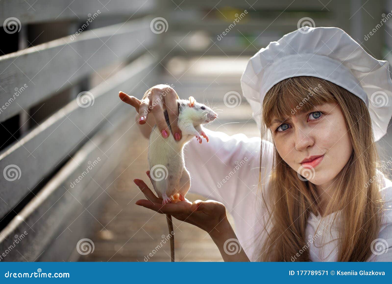 Cook in a Cook Hat with a Rat in His Hands. Cute Rat, Symbol of Stock ...