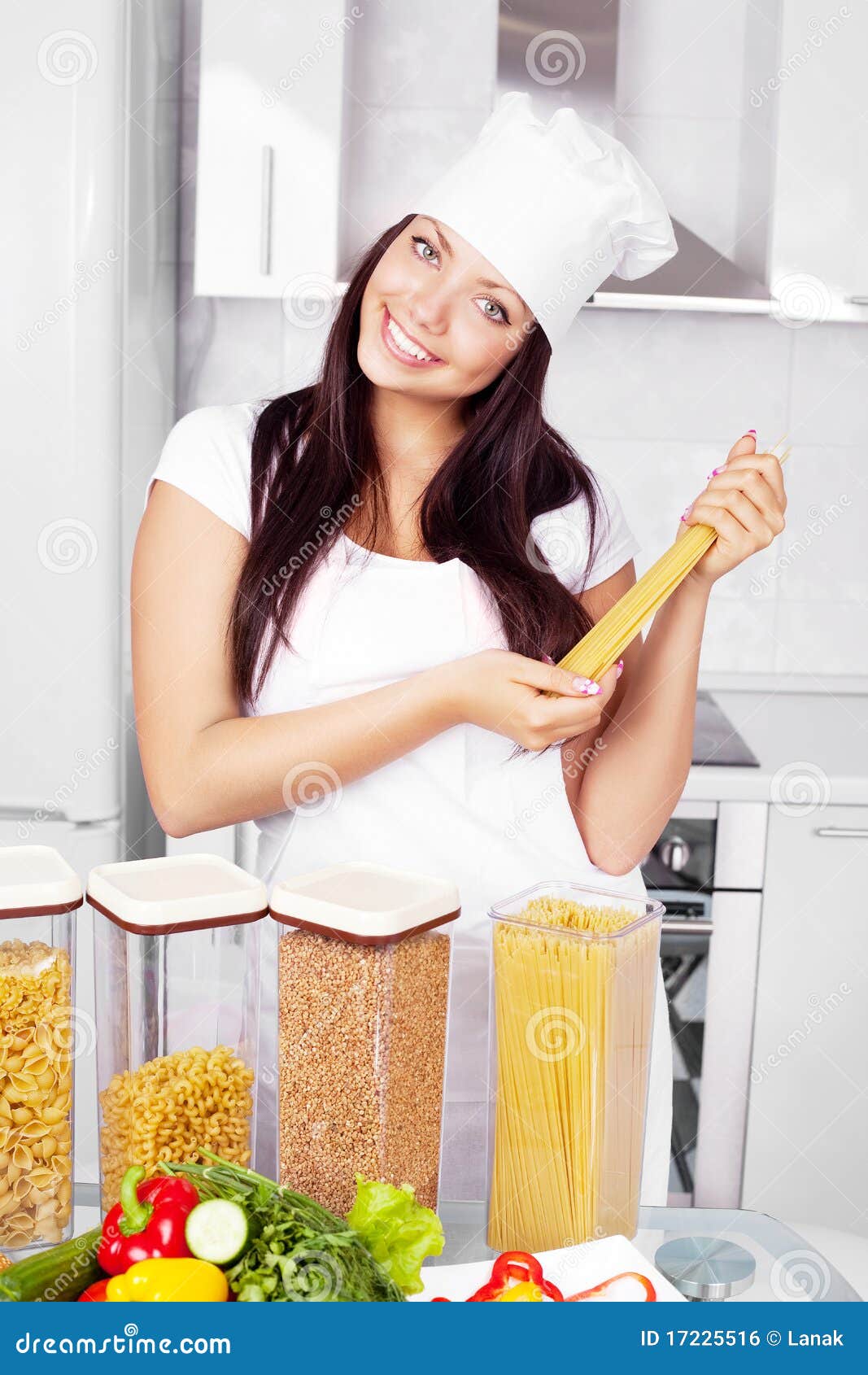 Cook in the kitchen stock photo. Image of brunette, cook - 17225516