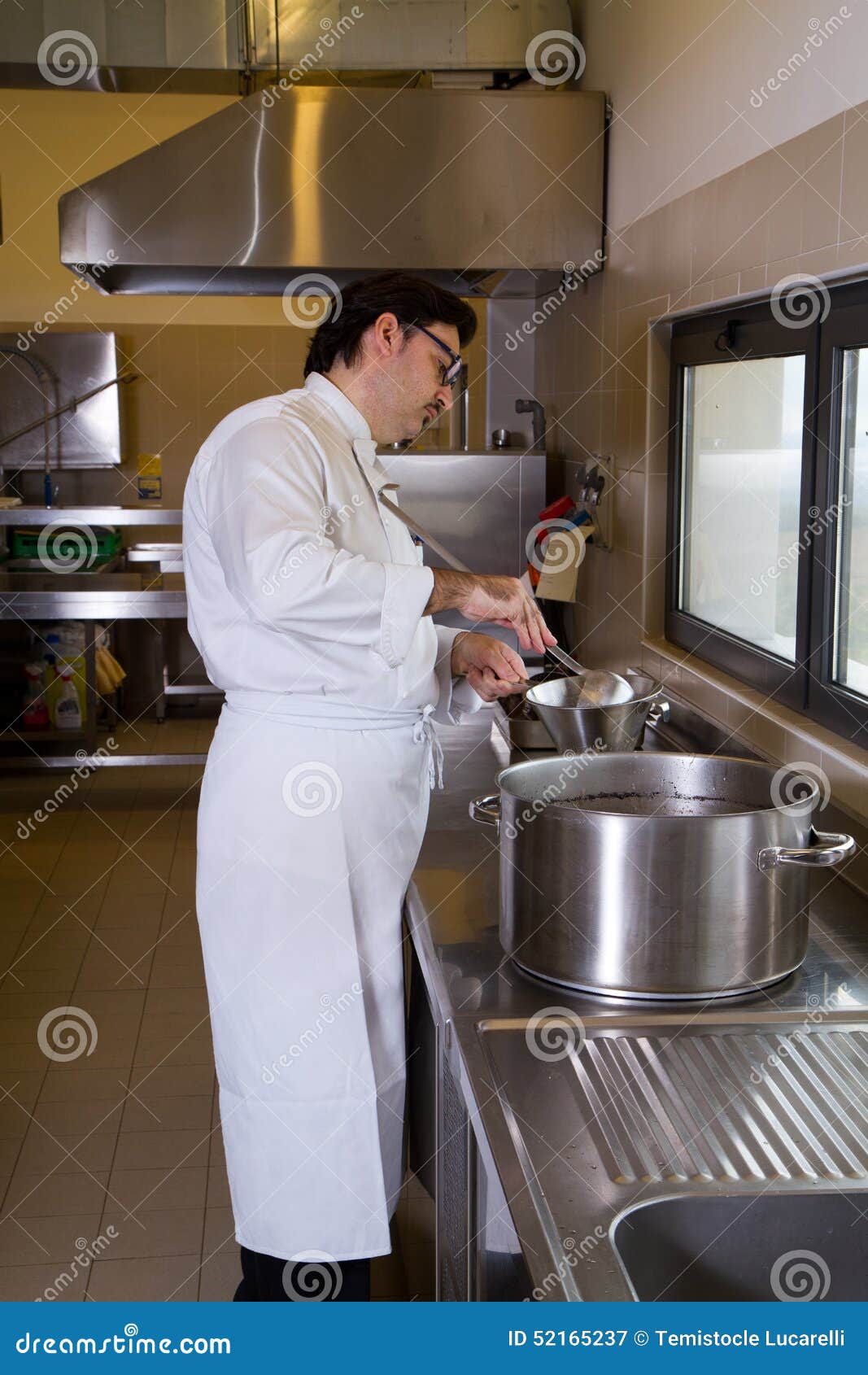 Cook in a kitchen stock image. Image of restaurant, dessert - 52165237