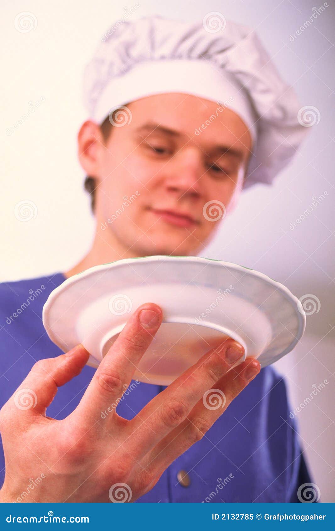Cook looks at plate stock image. Image of cafe, hand, plate - 2132785