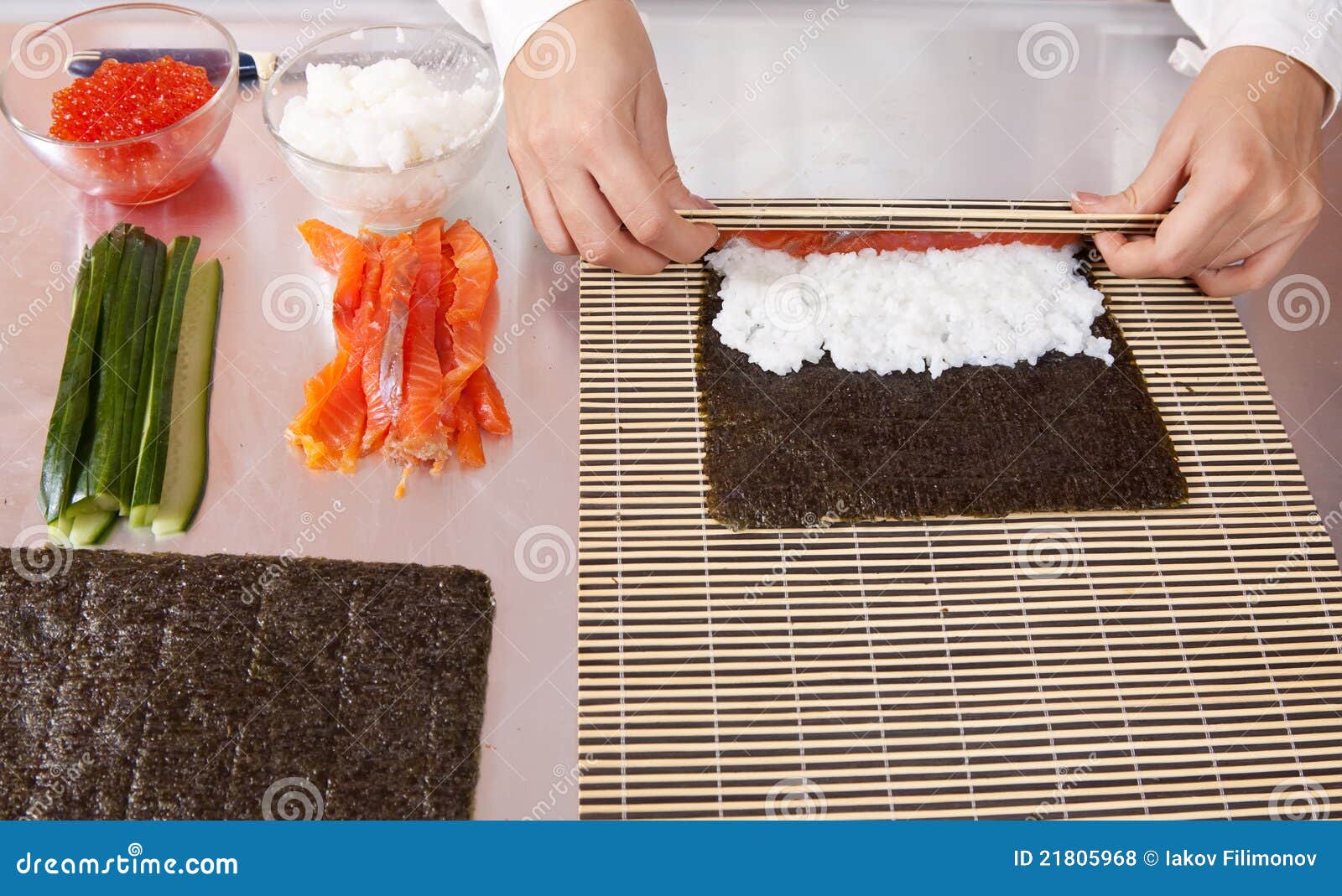 Cook making sushi rolls stock photo. Image of japaneese - 21805968