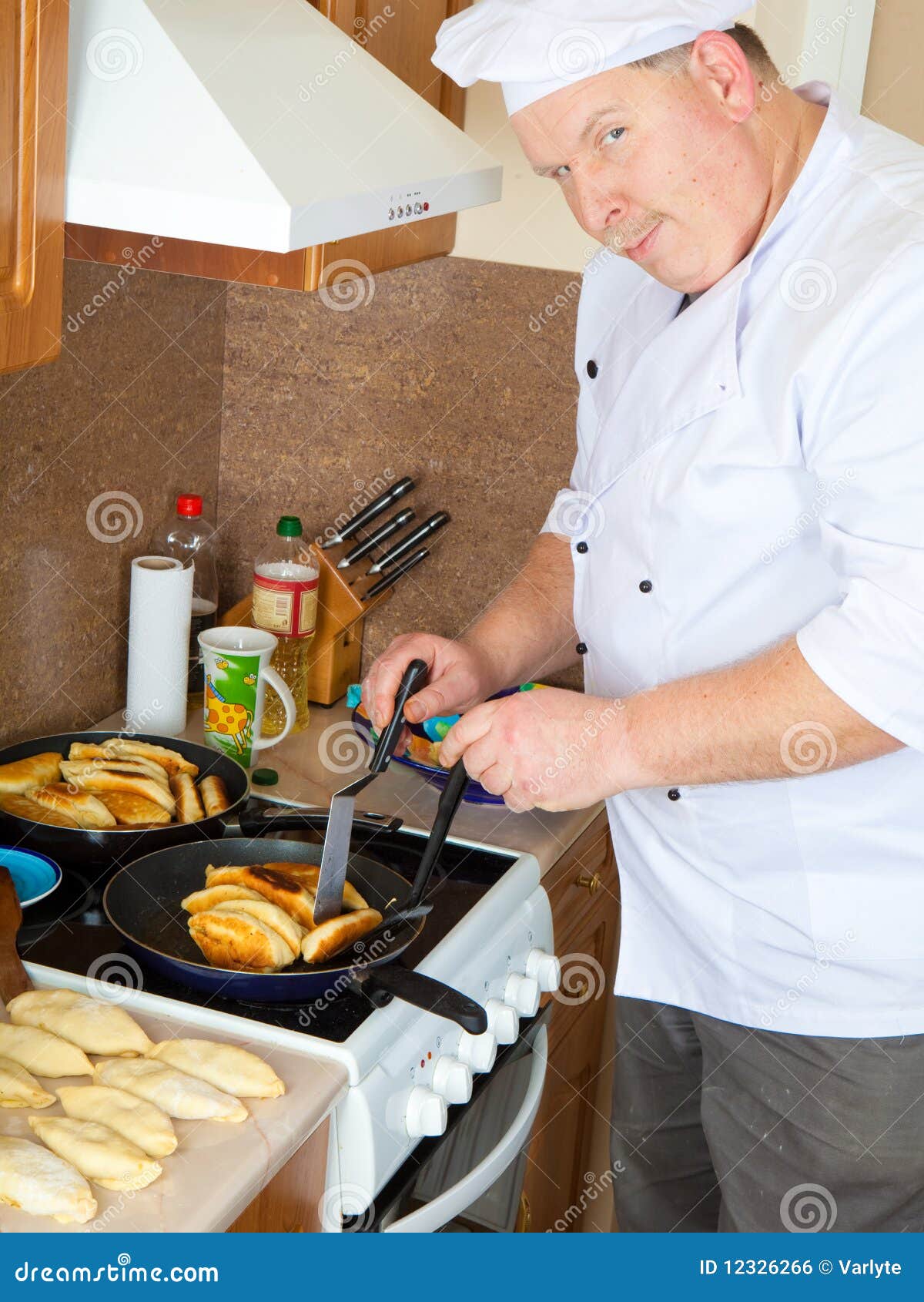 Cook man in kitchen stock photo. Image of people, cook - 12326266