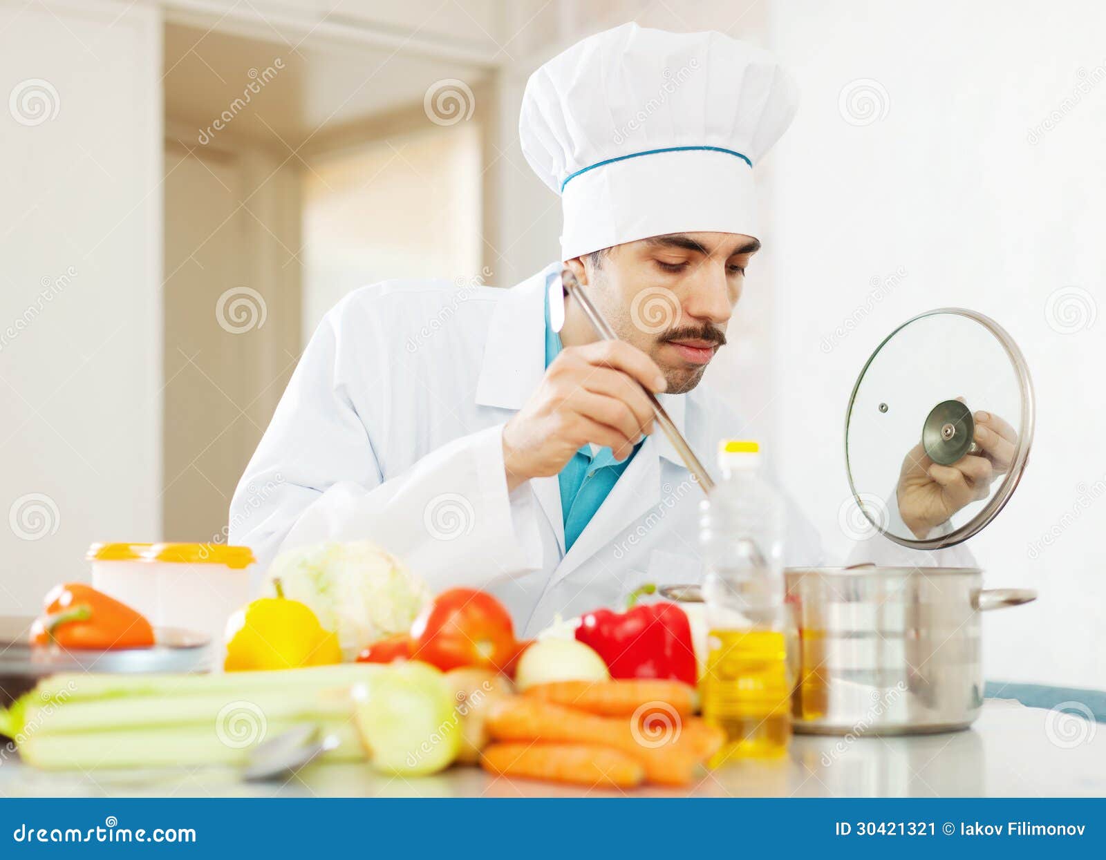 Cook man tasting soup stock image. Image of male, souce - 30421321