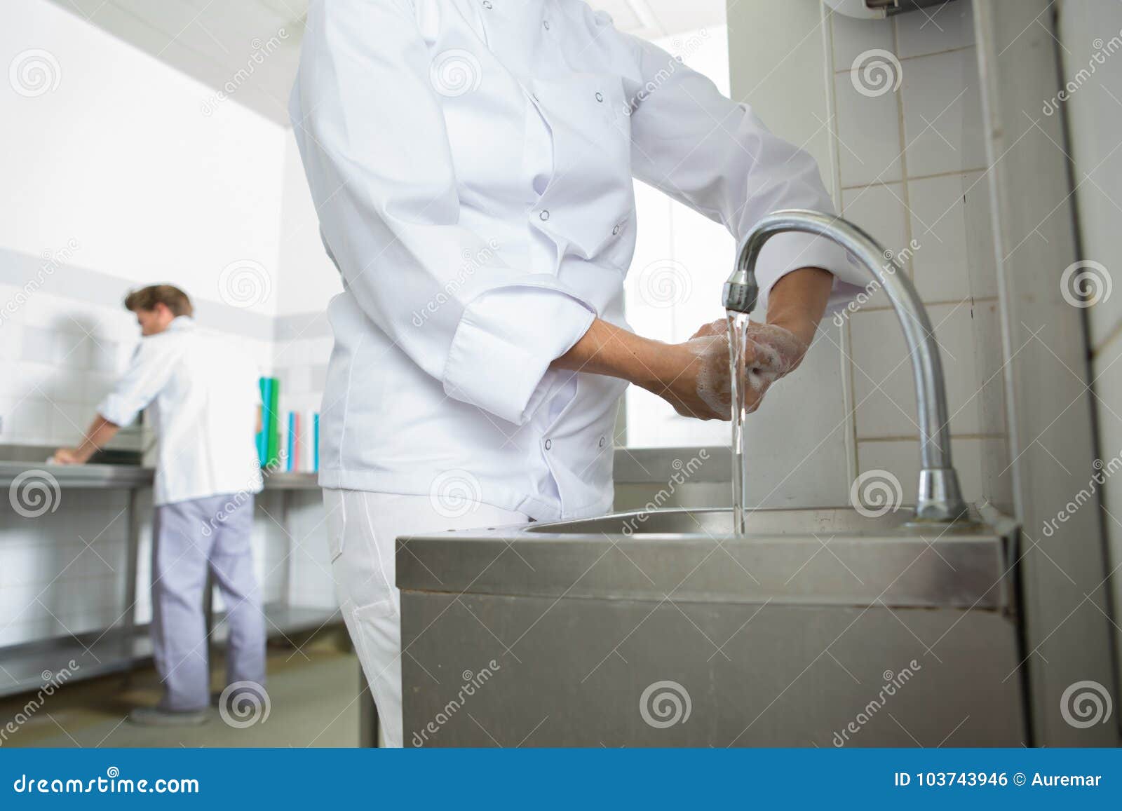 Cook man cleaning hands stock photo. Image of uniform - 103743946