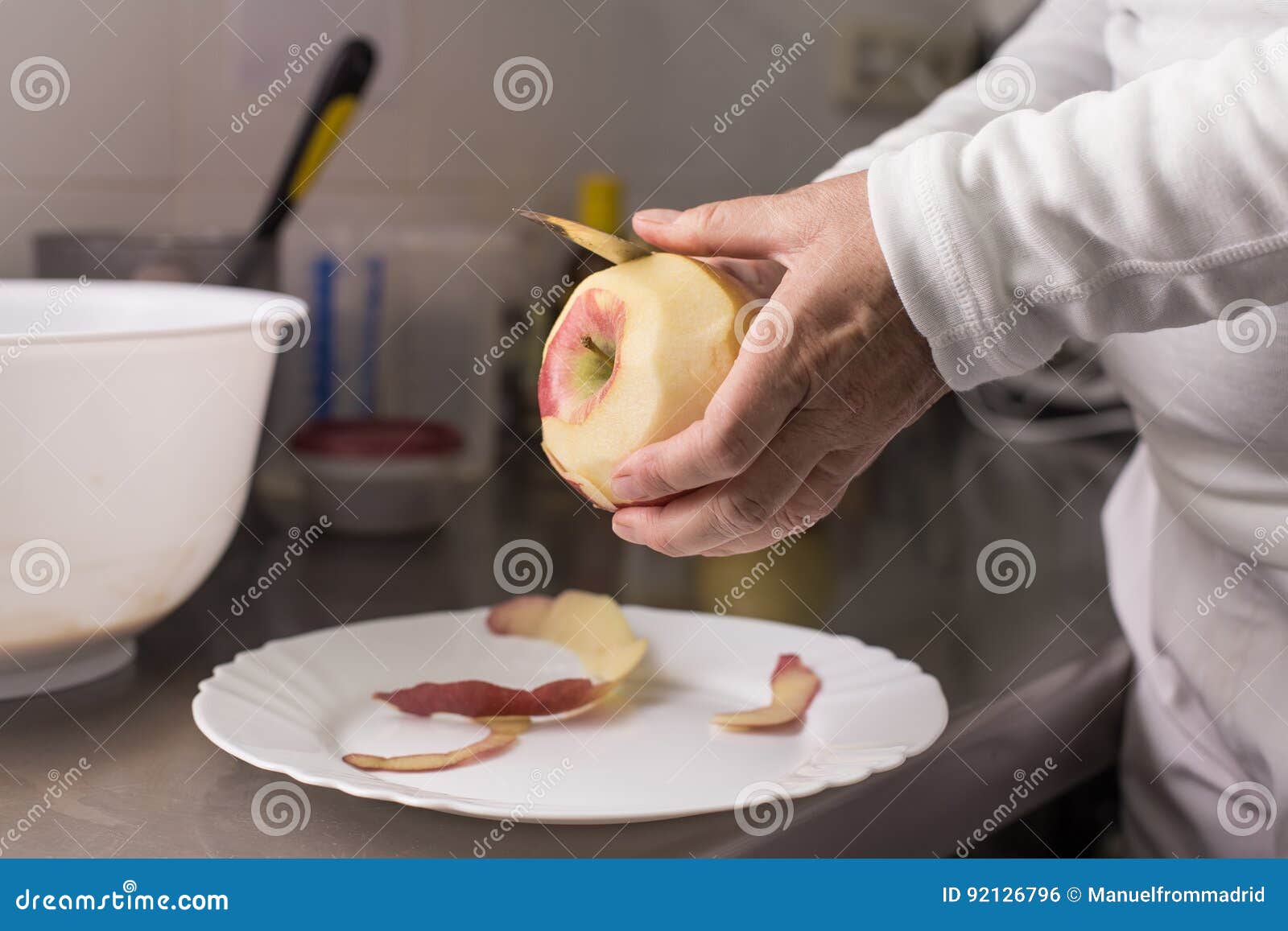 Cook Peeling Apples in the Kitchen Stock Photo - Image of recipe, white ...