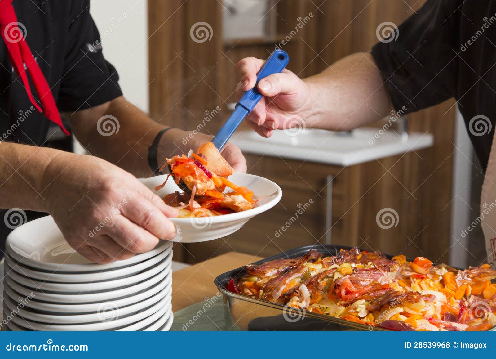 Cook is Portioning the Meal Stock Photo - Image of food, eating: 28539968