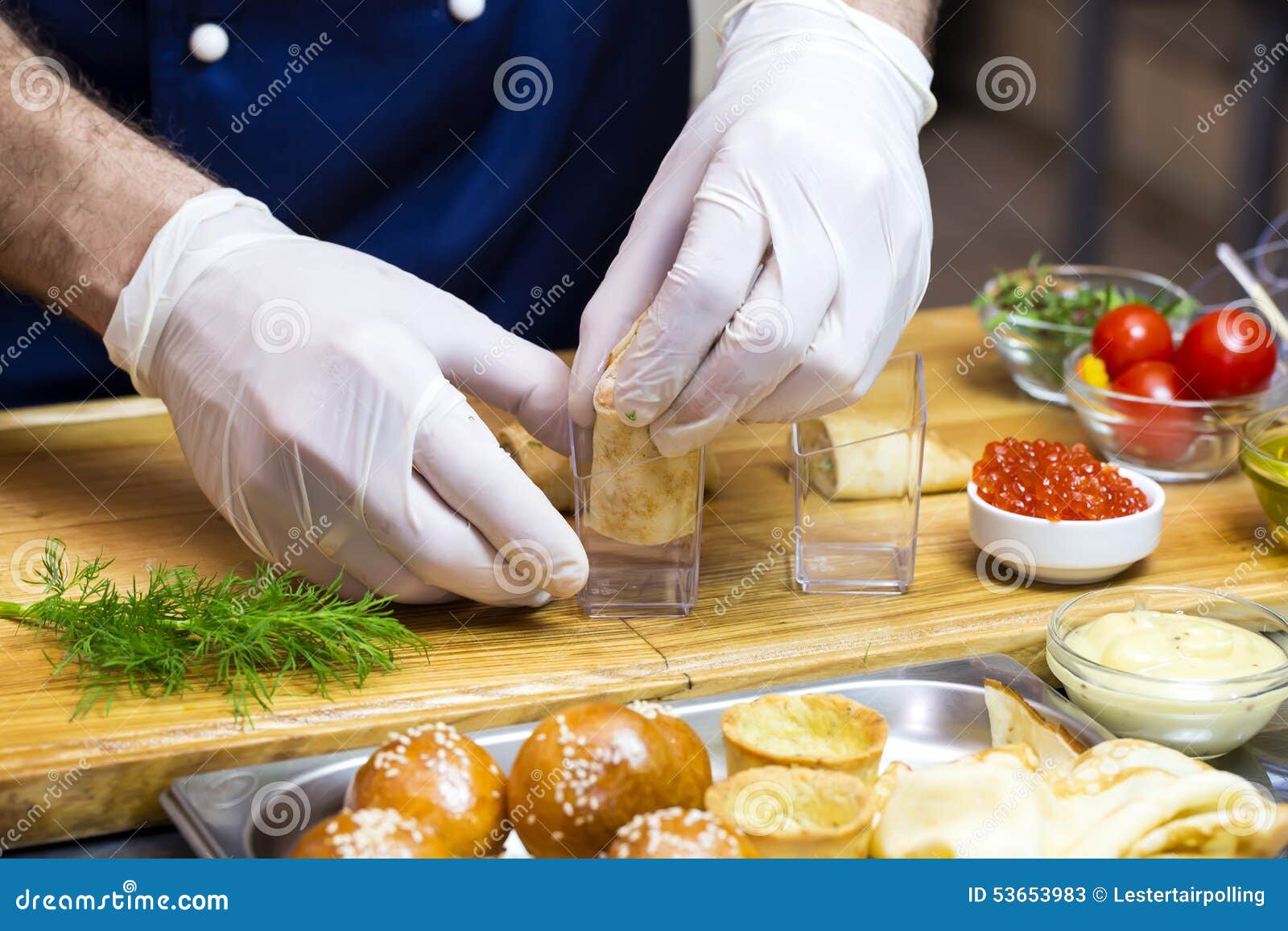 Cook prepares canapes stock image. Image of cuisine, garnishing - 53653983