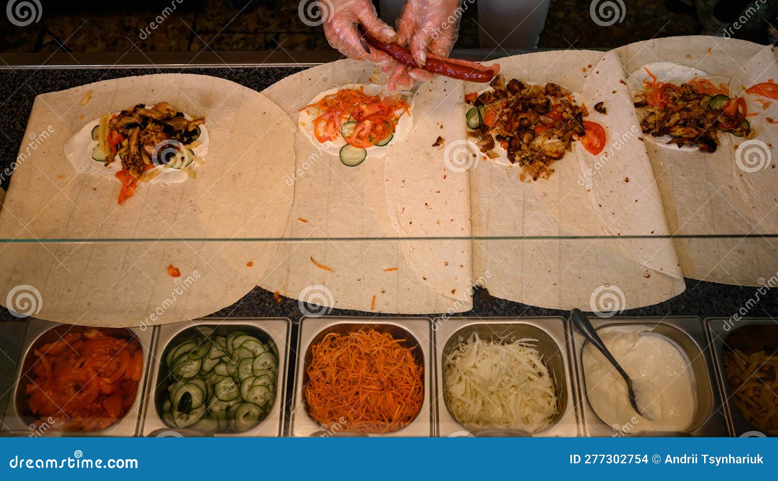 The Cook Prepares Shawarma from Vegetables and Meat, Four Sheets of ...
