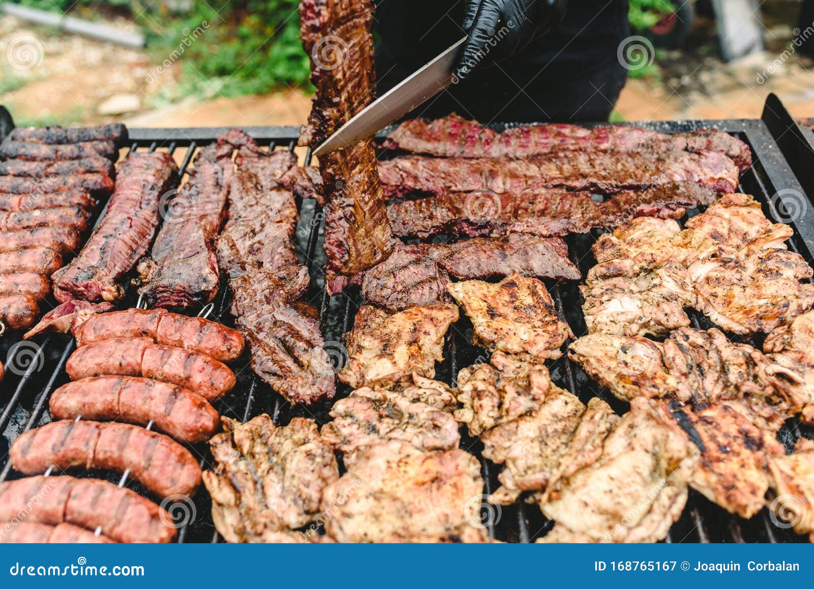Cook Preparing Grilled Meat during a Barbecue Stock Image - Image of ...