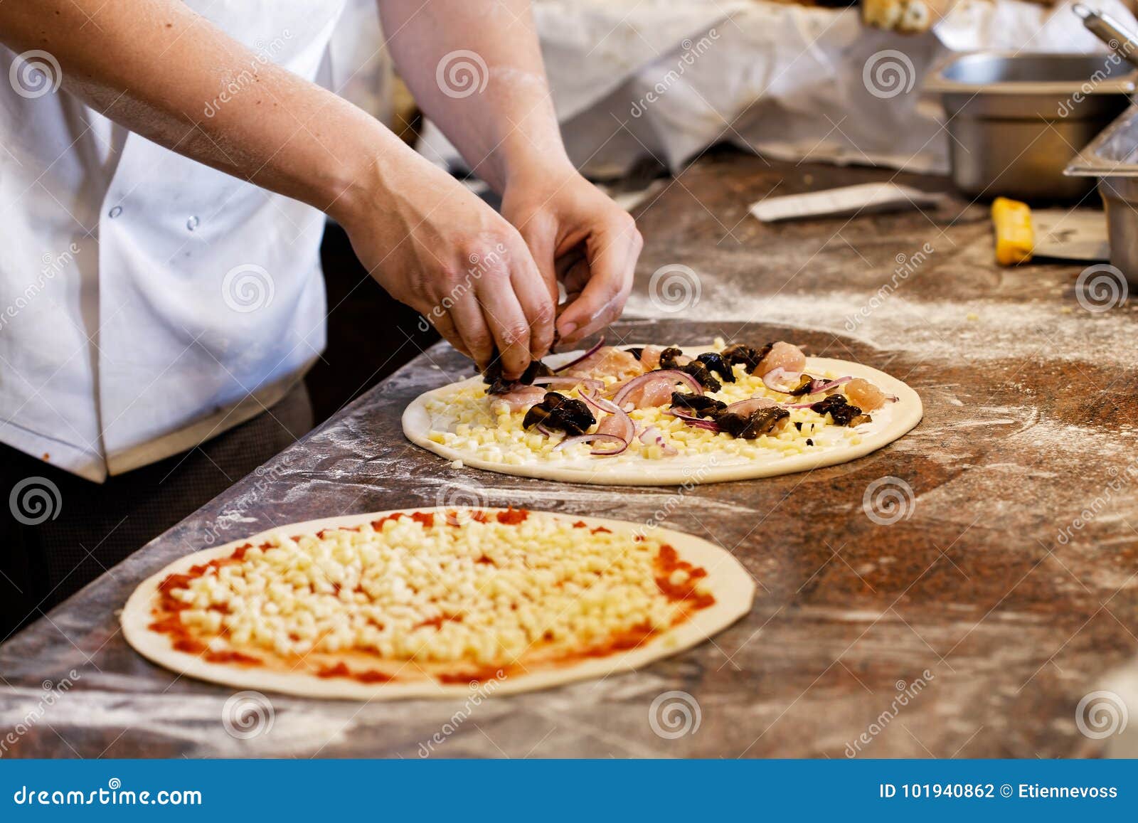 Cook Putting Toppings on Two Pizzas. Stock Photo - Image of chicken ...
