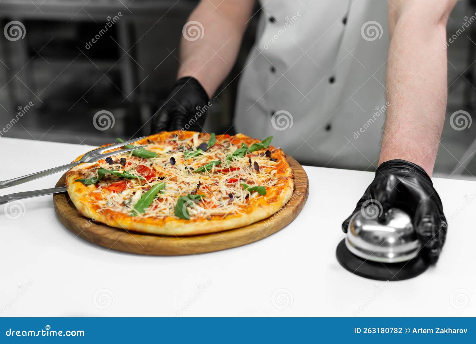 Cook with a Ready-made Dish with Pizza Stock Photo - Image of bell ...
