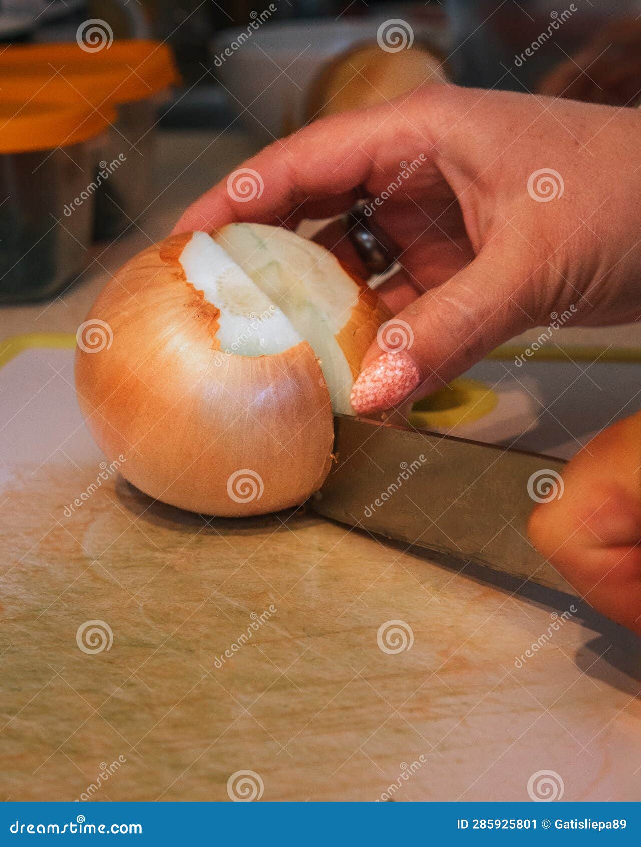 A Cook S Hands Cut a Large Onion in Half Stock Image - Image of large ...