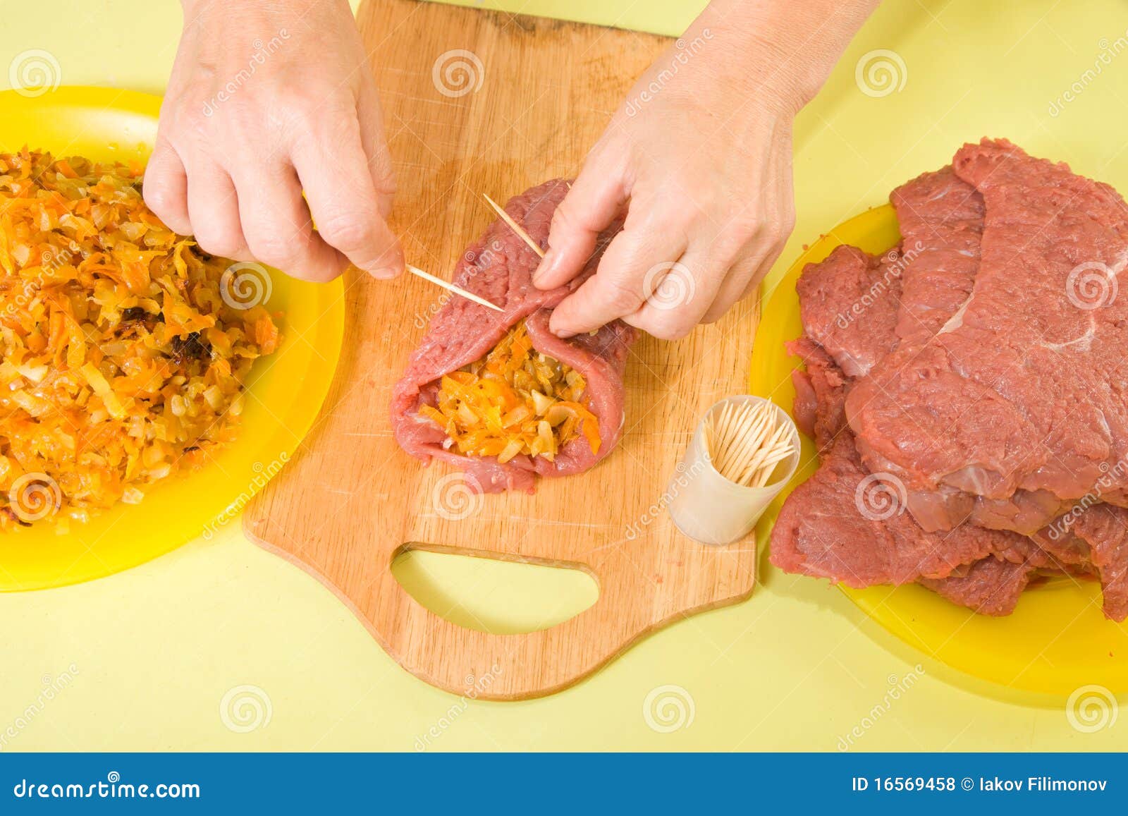 Cook Sewing Stuffed Beef by Toothpicks Stock Photo - Image of pick ...