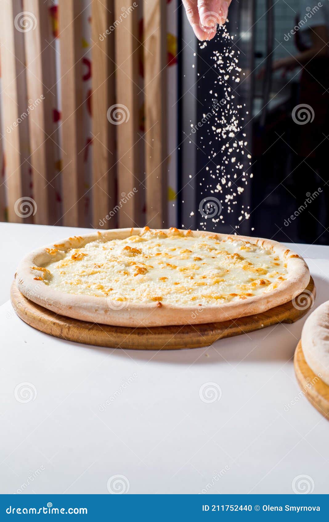 Cook Sprinkles the Cheese on the Pizza. Stock Photo - Image of dough ...