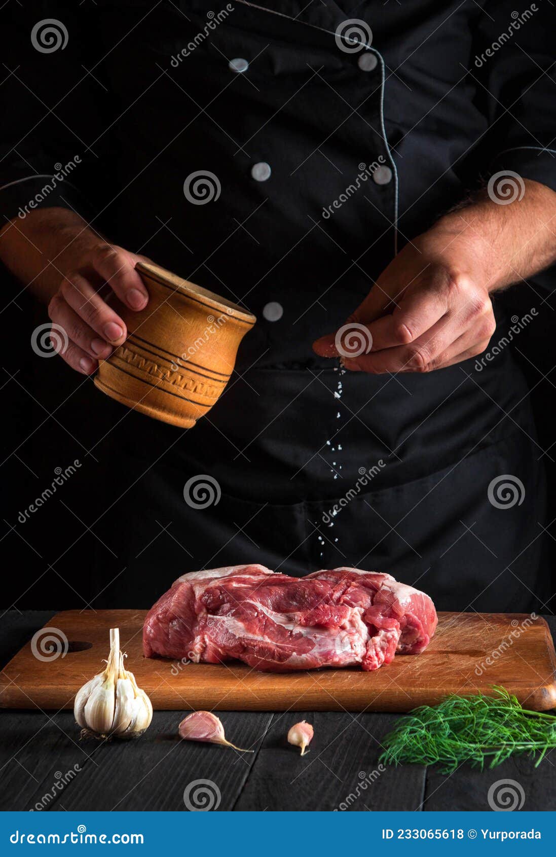 Cook Sprinkles Meat with Salt. Preparing Meat before Baking Stock Photo ...