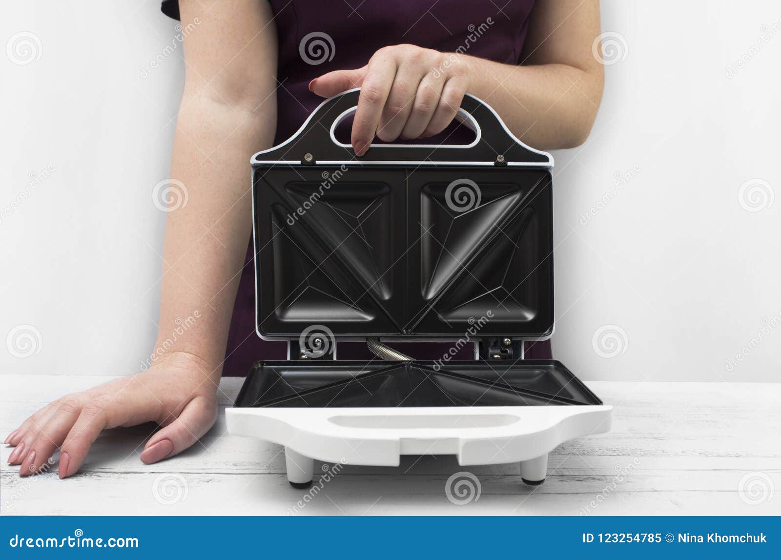 A cook woman with toaster stock image. Image of open - 123254785