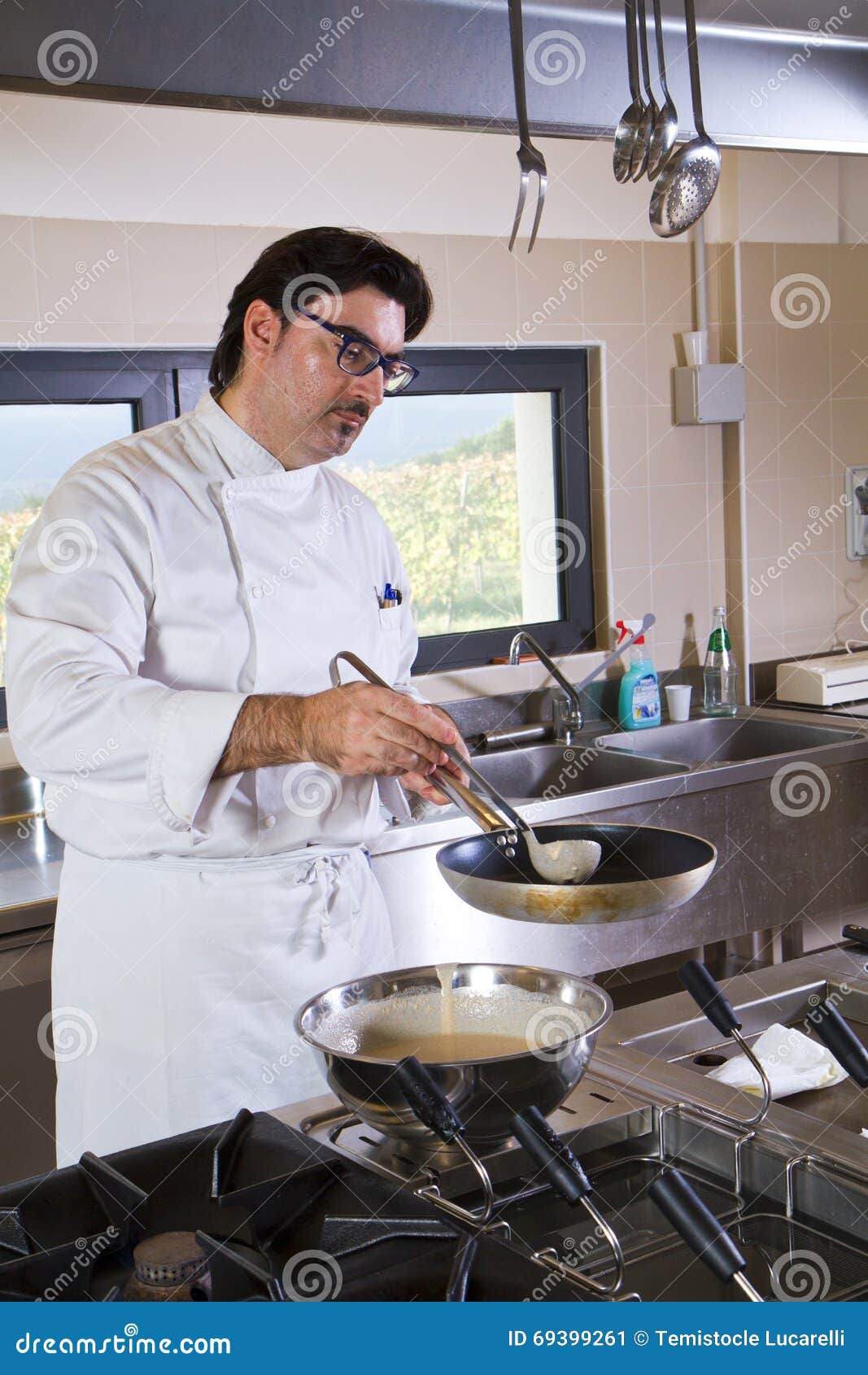 Cook at work stock image. Image of garnishing, person - 69399261