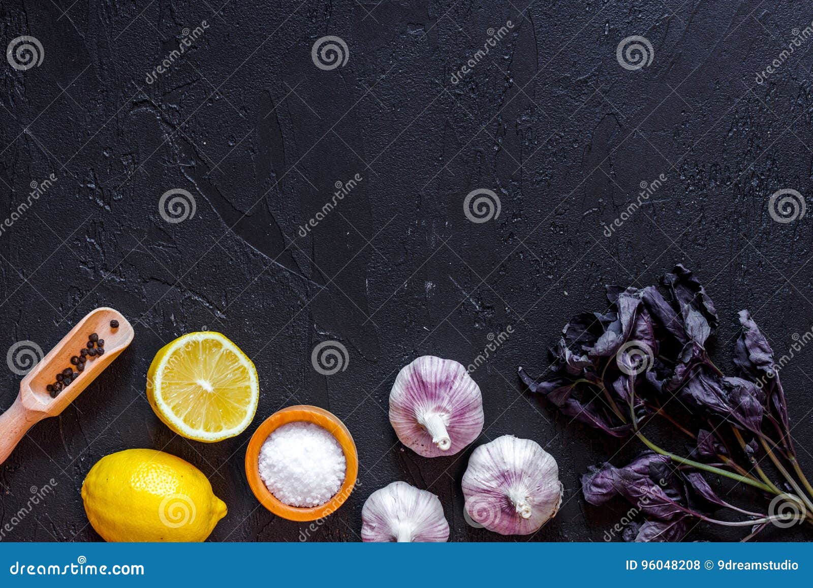 Cook Workplace. Lemon, Garlic, Basil on Black Table Background Top View ...