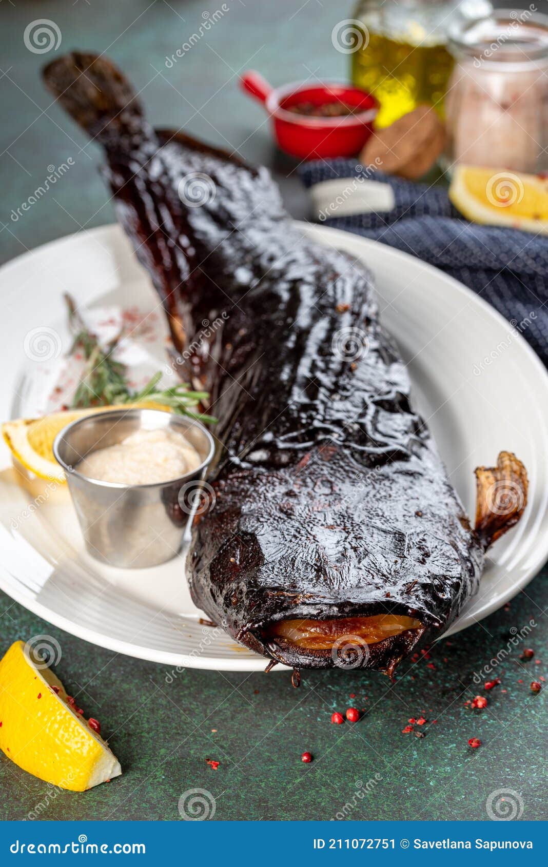 Cooked Catfish on Fire in a White Plate Stock Image - Image of ...