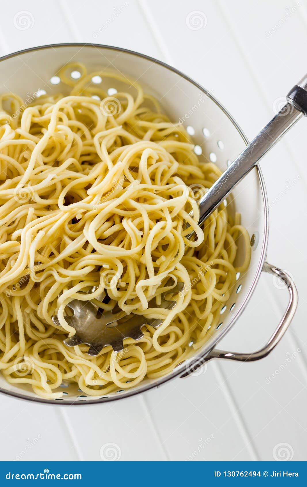 Cooked chinese noodles. stock photo. Image of colander - 130762494