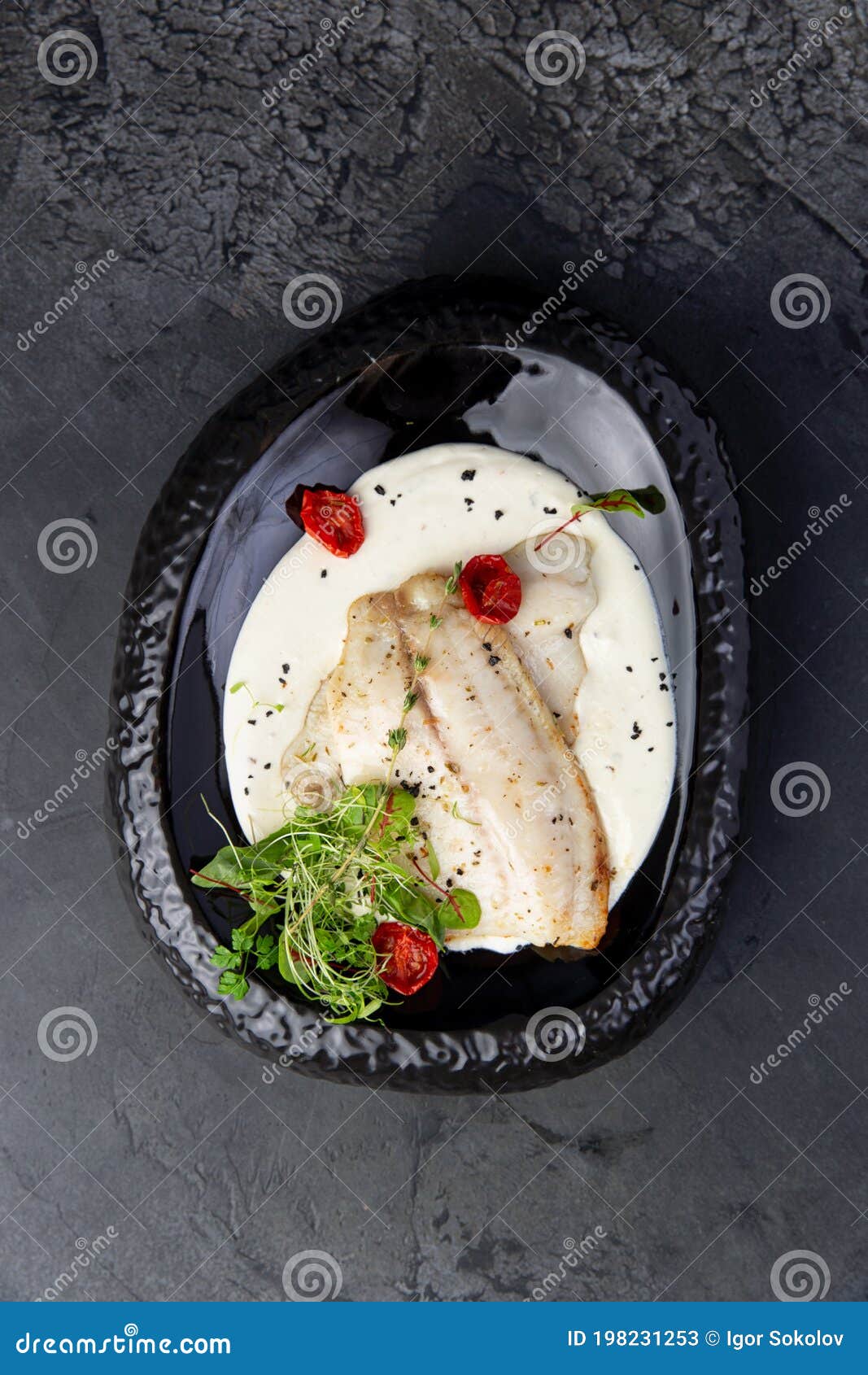 Cooked Cod Fillet in a Dark Plate. Stock Image - Image of cooked ...