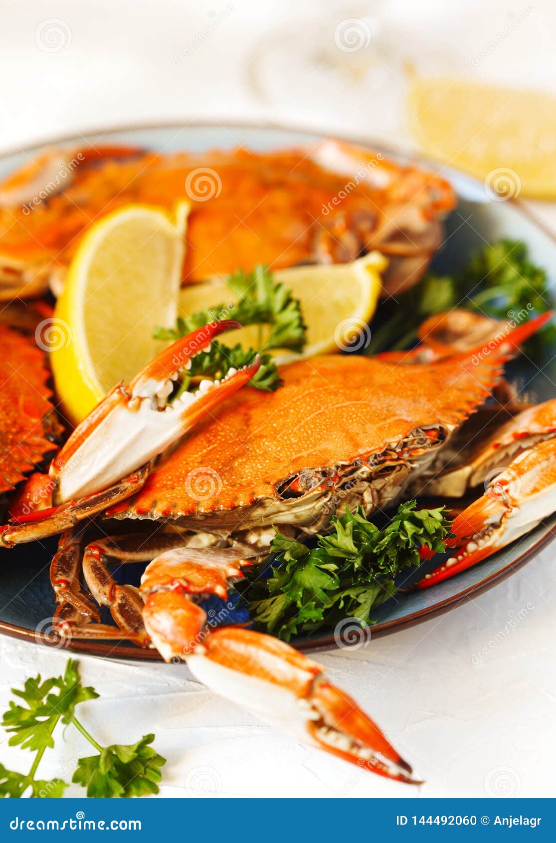 Cooked Crabs with Lemon and Parsley Stock Photo - Image of lobster ...