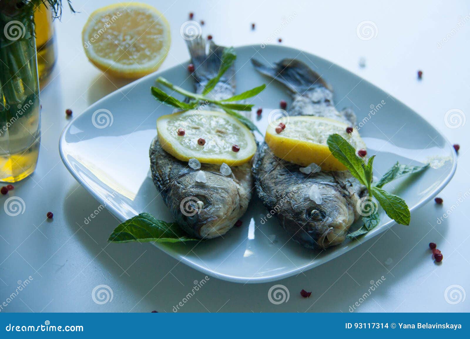 Cooked fish with lemon stock photo. Image of perfect - 93117314