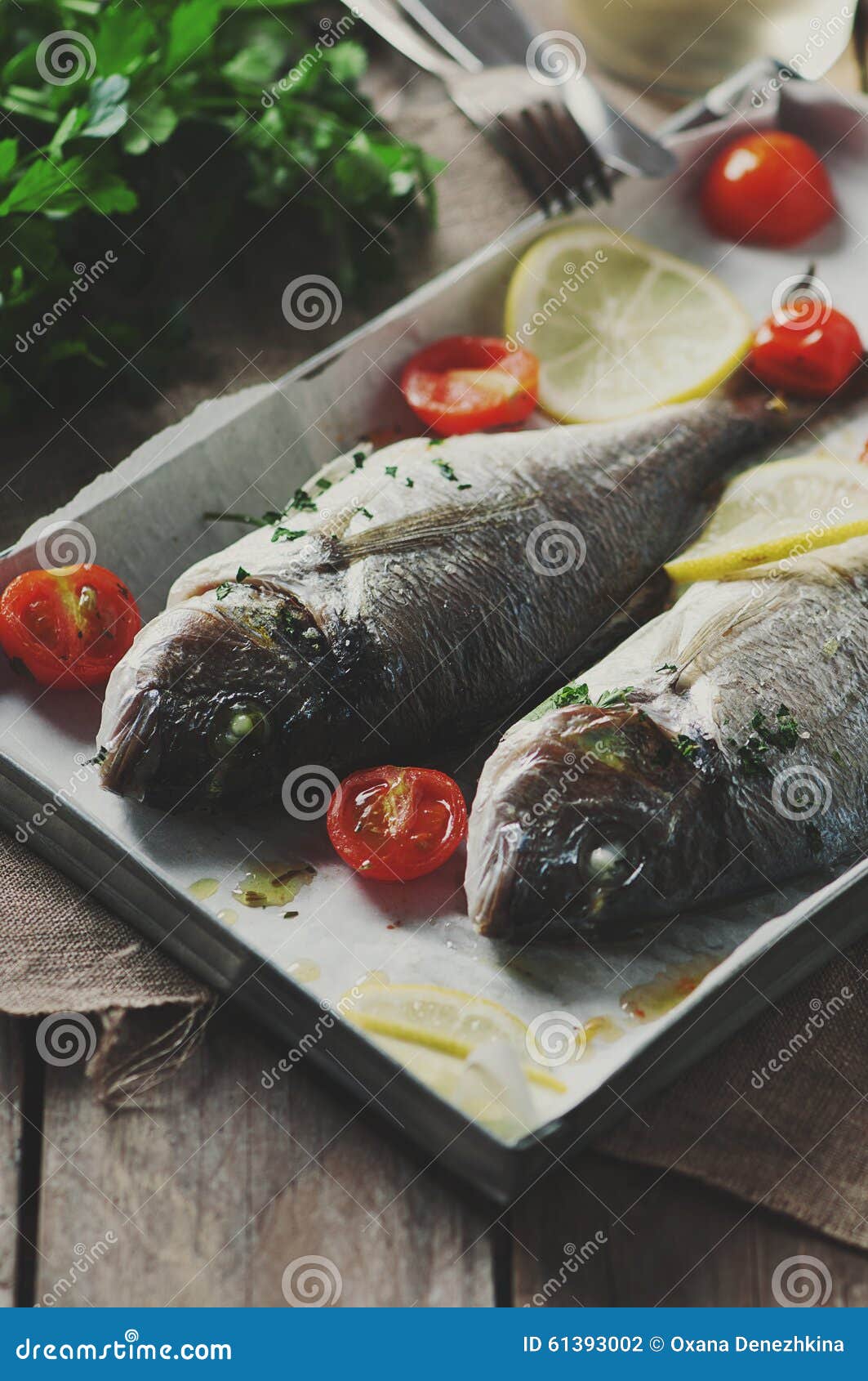 Cooked fish with parsley stock photo. Image of tasty - 61393002
