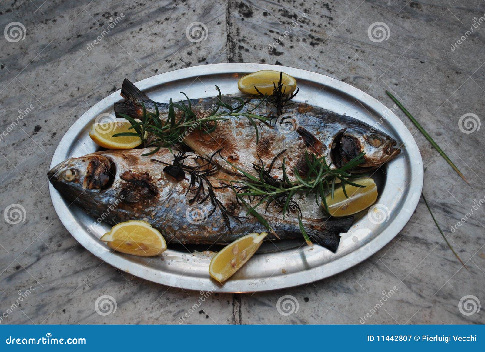 Cooked fish on a platter stock image. Image of health - 11442807