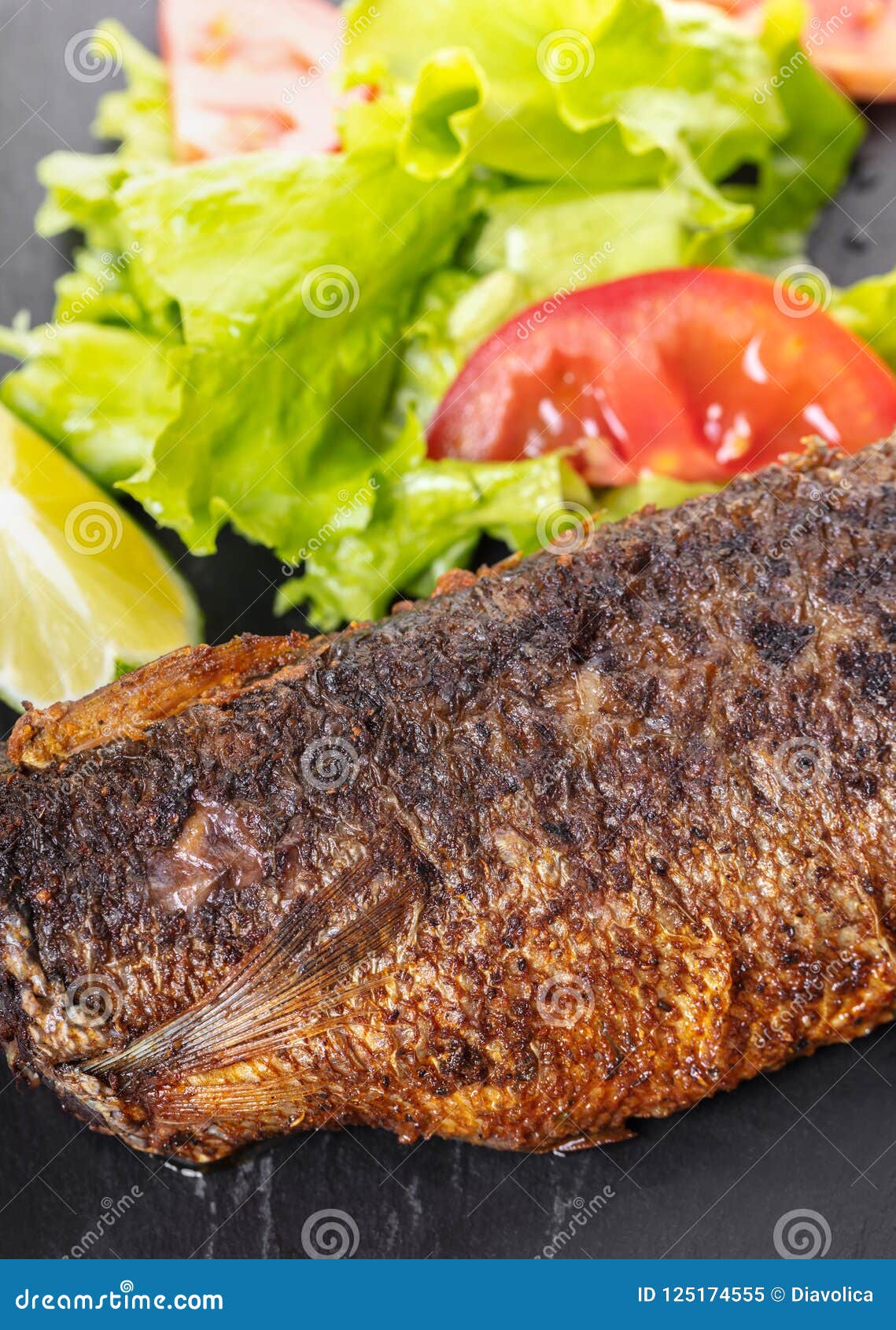 Cooked Fish with Vegetables Stock Image - Image of cuisine, fish: 125174555