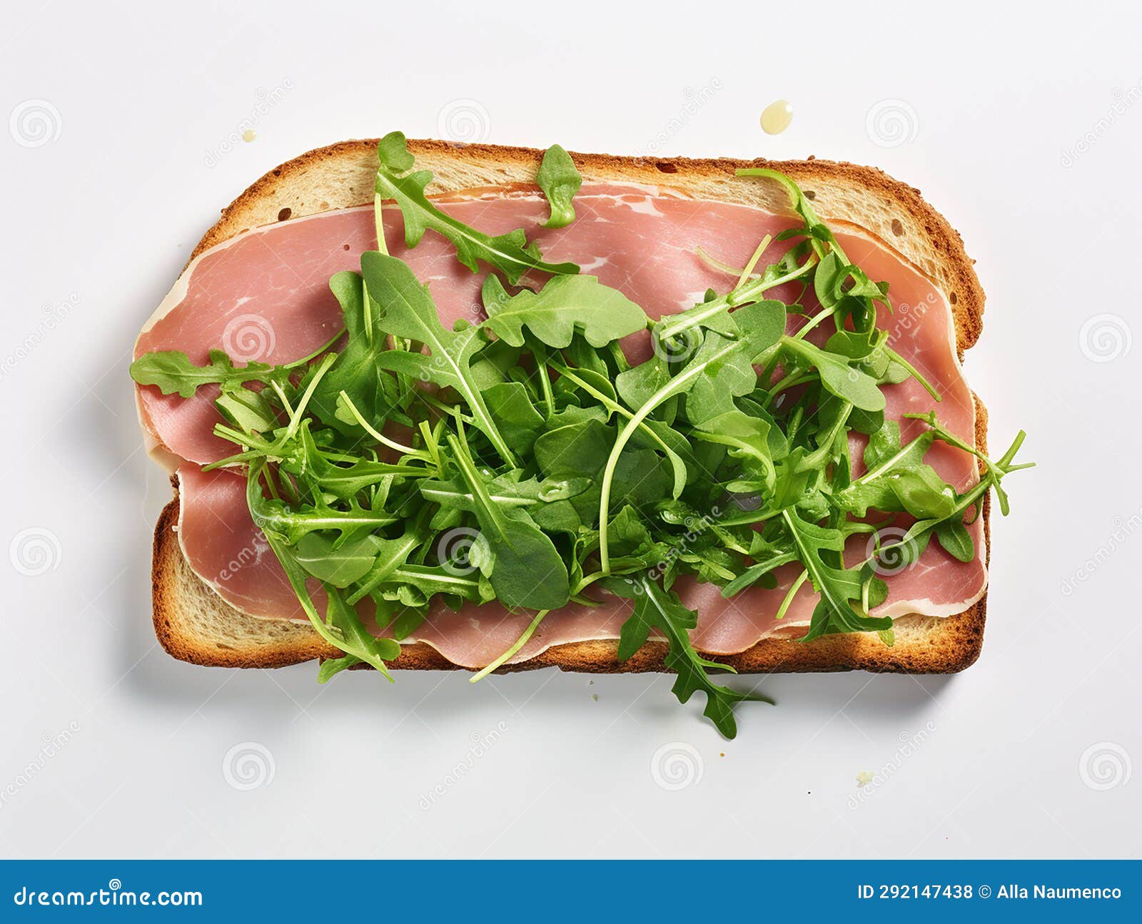 Cooked Ham on a Rectangular Piece of Bread Spread with Avocado Purée ...