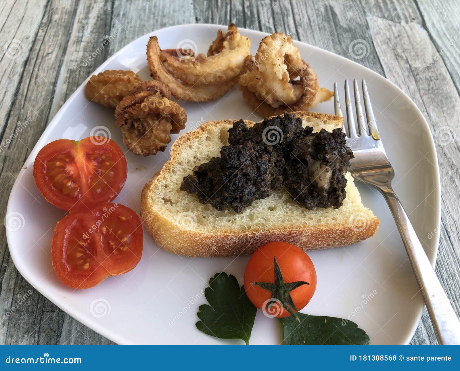 Cooked Octopus Liver on a Toasted Bread Stock Photo - Image of meal ...