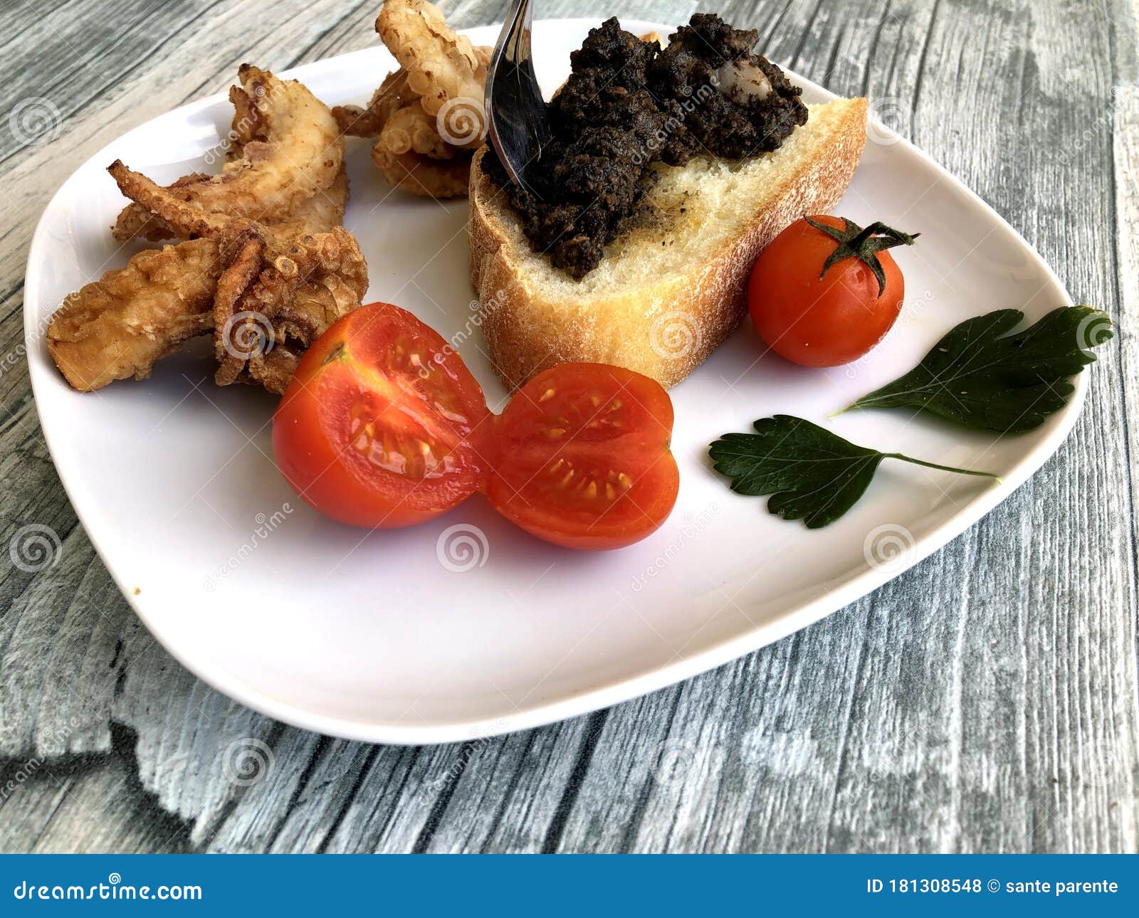 Cooked Octopus Liver on a Toasted Bread Stock Photo - Image of toasted ...