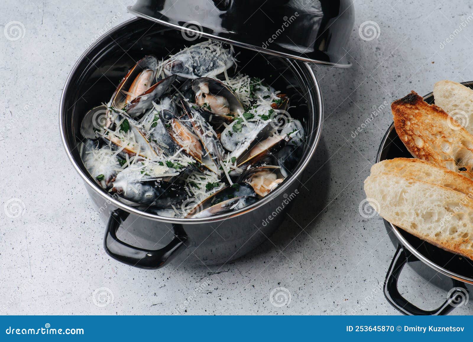 Cooked Oysters in a Pot Sprinkled with Parmesan and Greens. on a Table ...