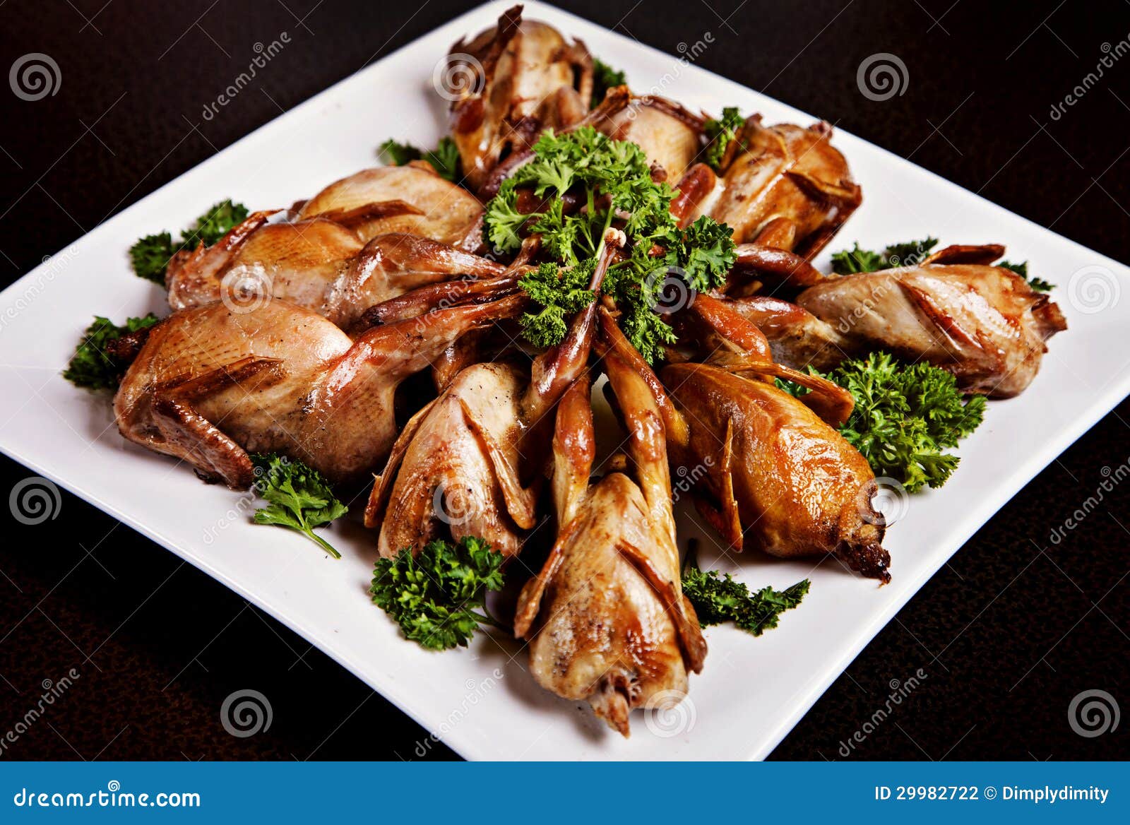 Cooked quail with parsley stock photo. Image of parsley - 29982722