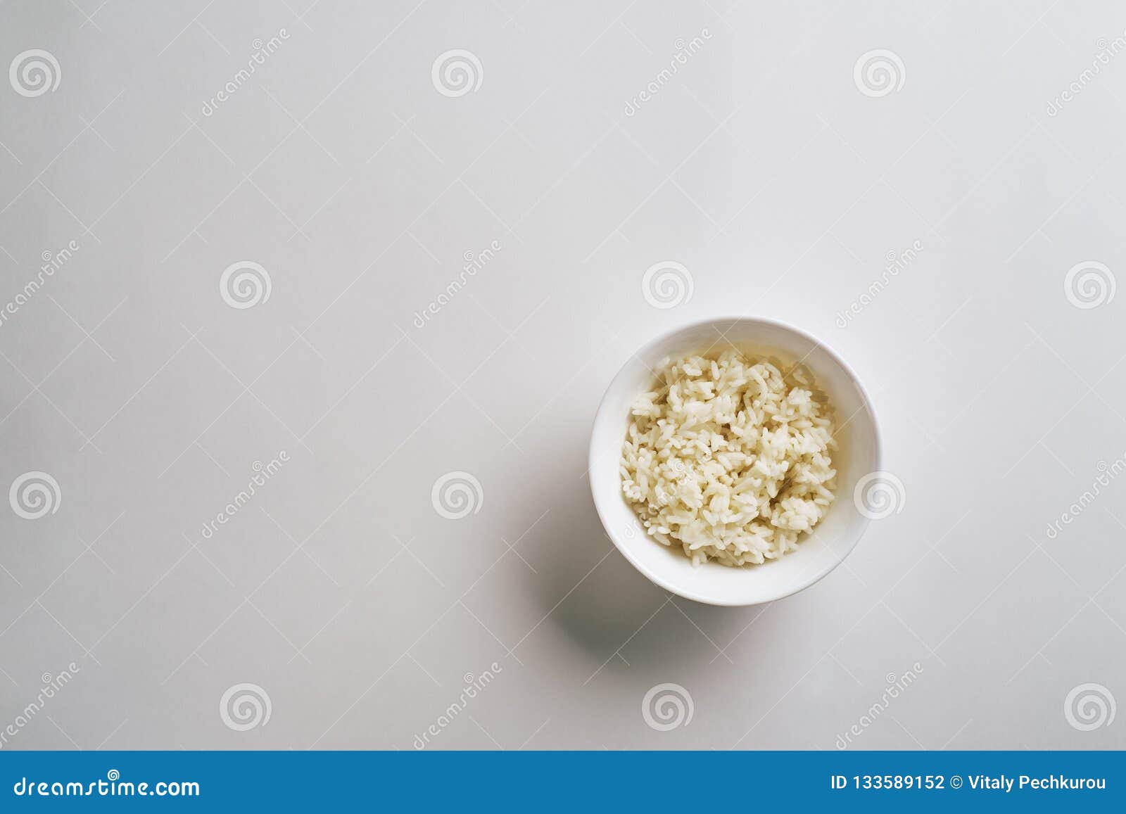 Cooked Rice in Plate Isolated on White Background. Top View Stock Photo ...