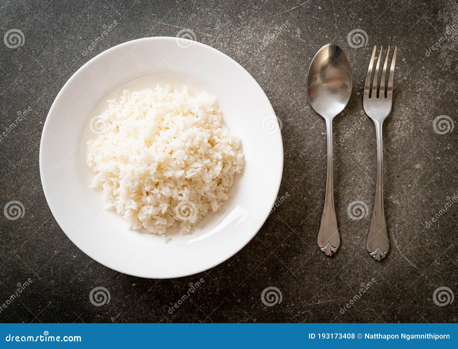 Cooked rice on plate stock photo. Image of lunch, cooking - 193173408