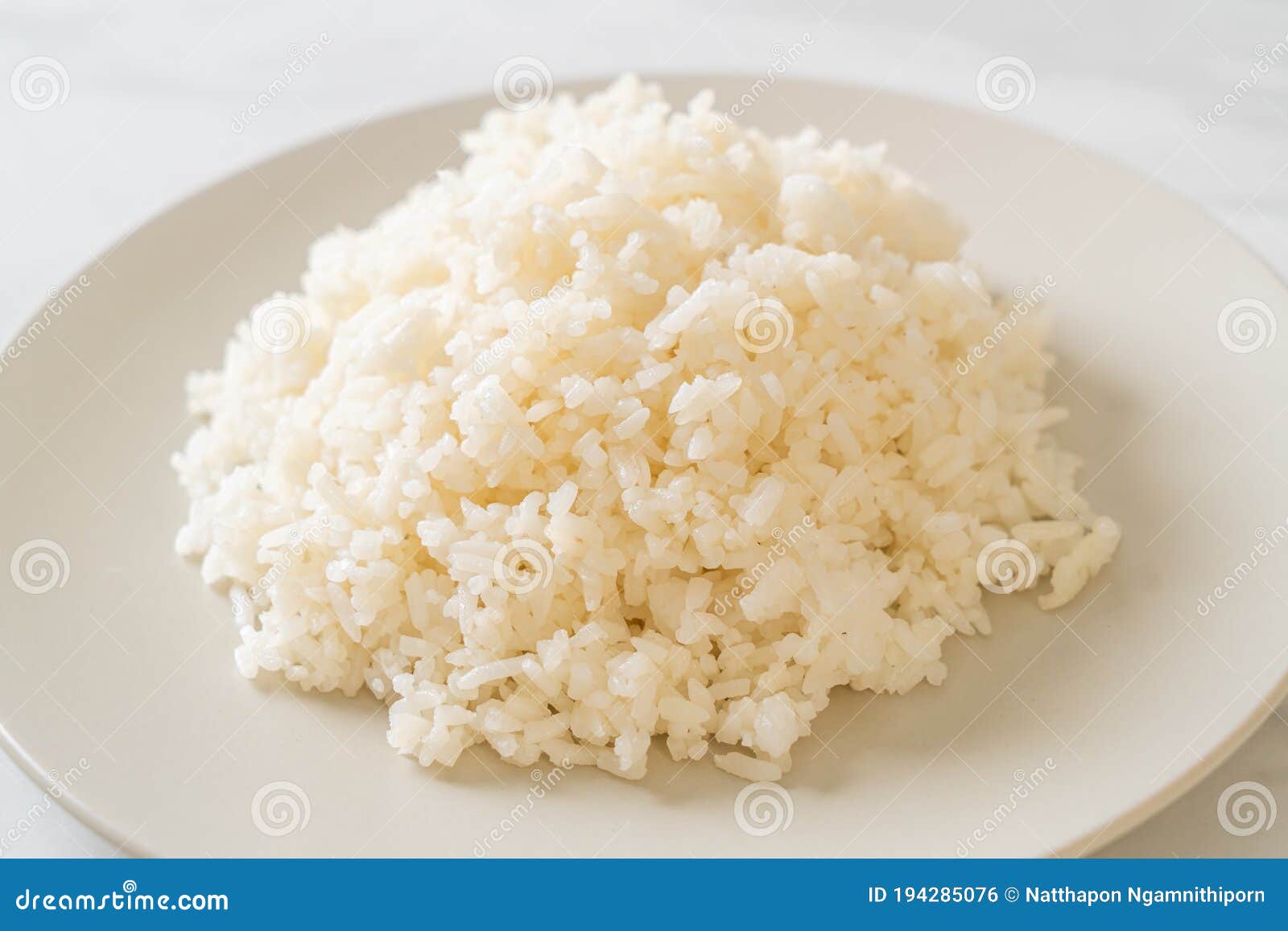 Cooked rice on plate stock photo. Image of plate, carbohydrate - 194285076