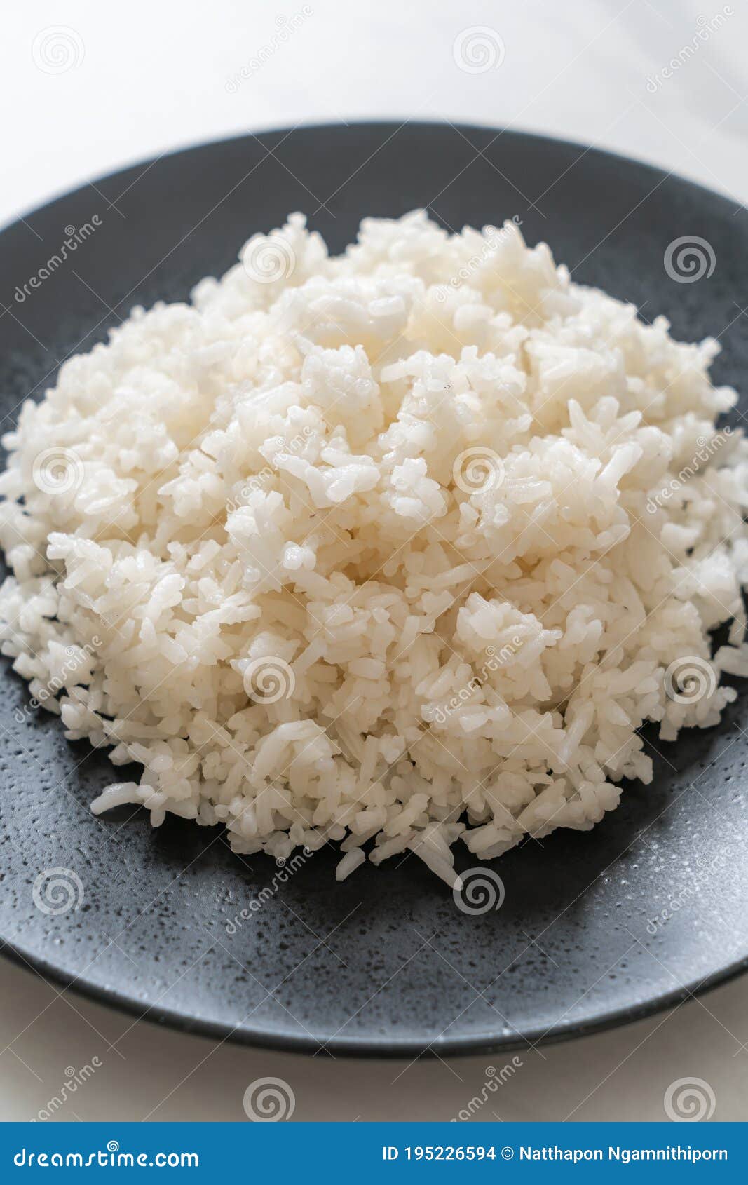 Cooked rice on plate stock photo. Image of jasmine, plate - 195226594