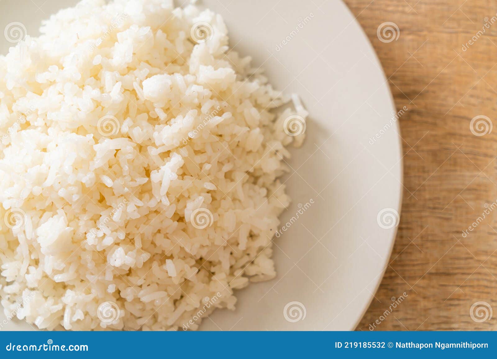 Cooked rice on plate stock photo. Image of cereal, cuisine - 219185532