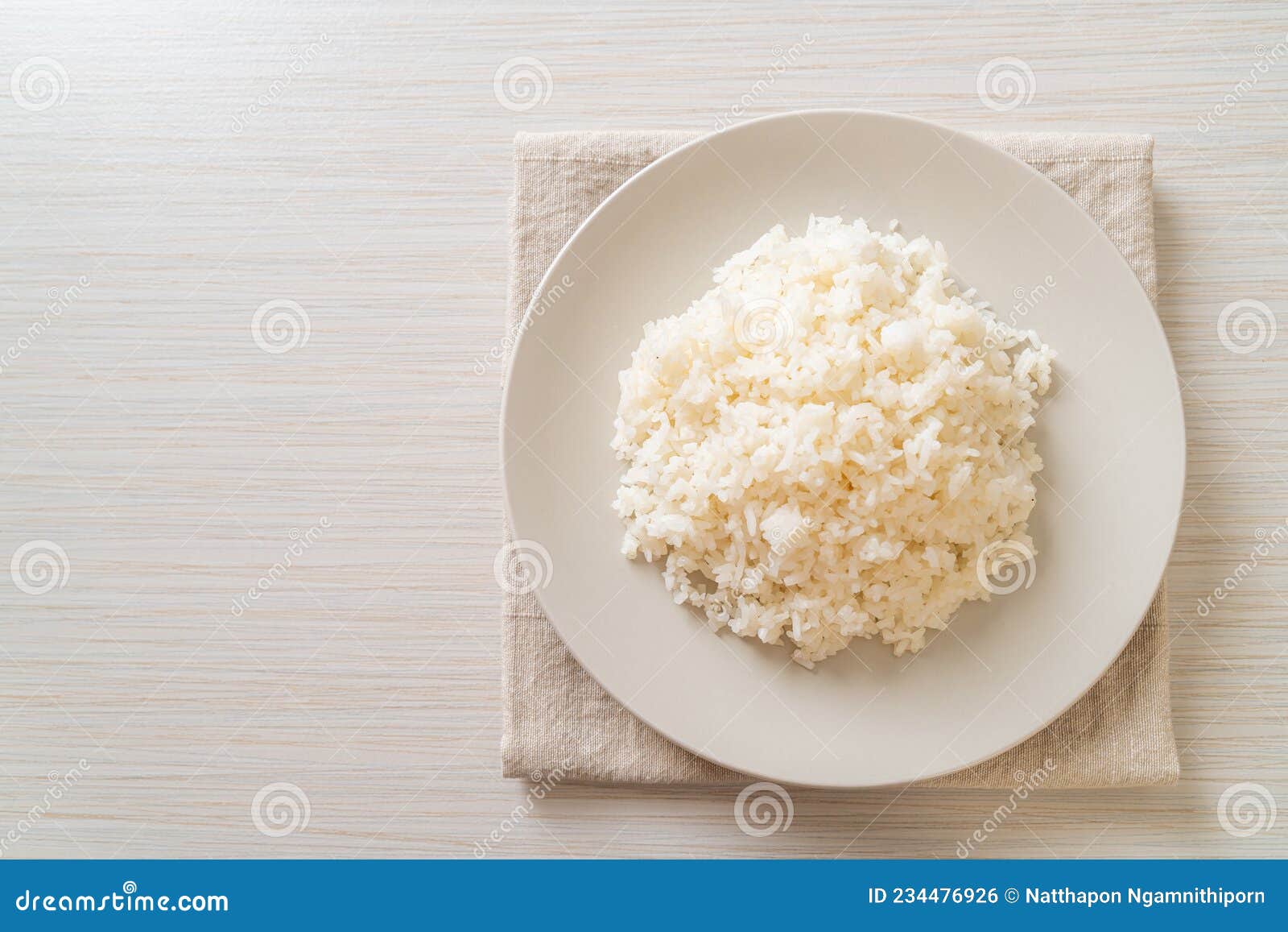 Cooked rice on plate stock photo. Image of restaurant - 234476926