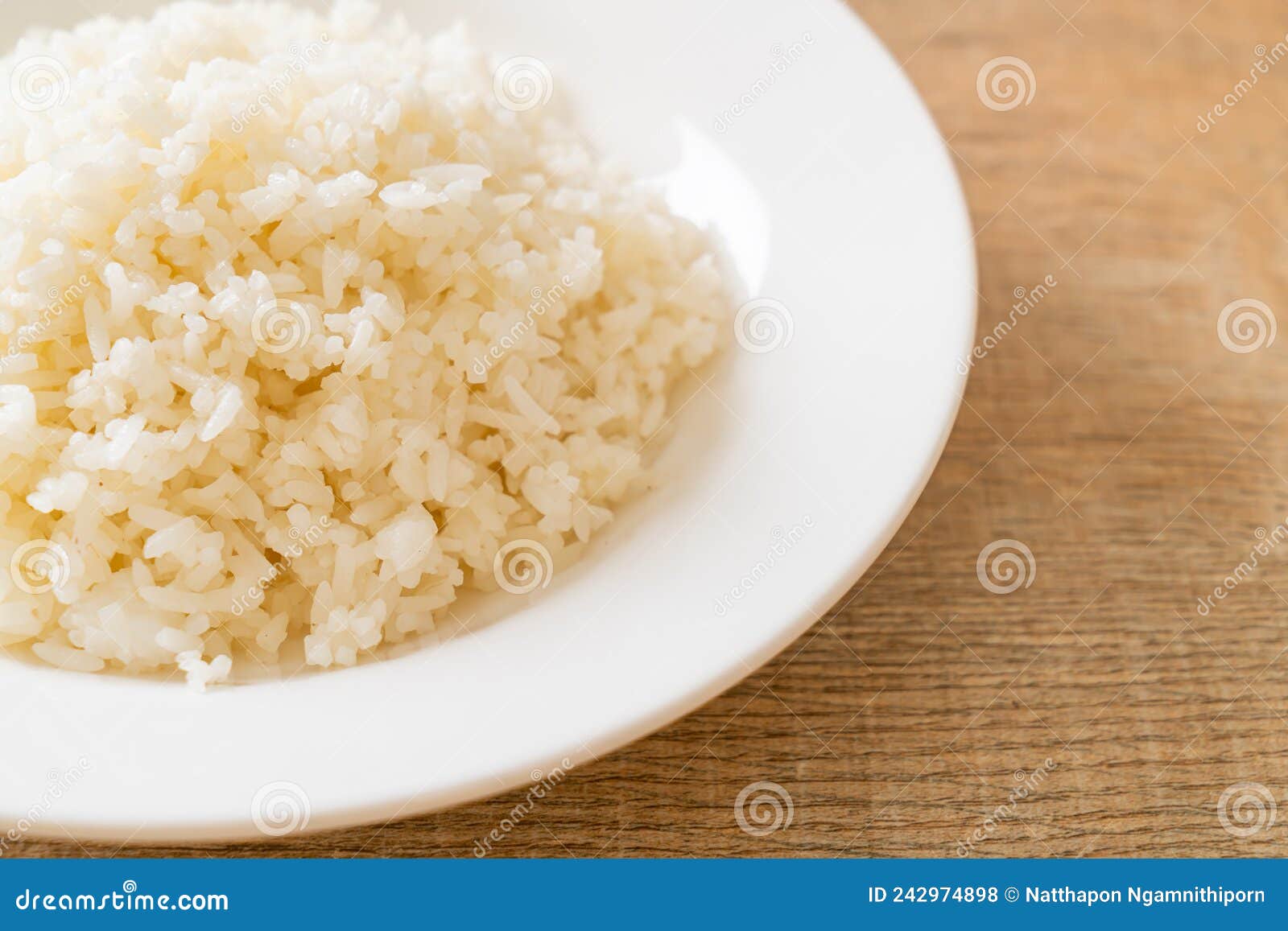 Cooked rice on plate stock photo. Image of background - 242974898