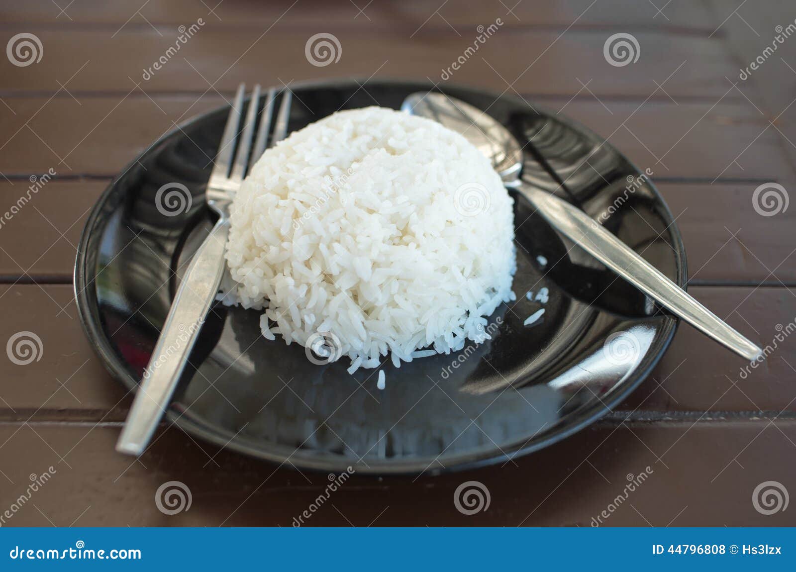 Cooked rice and spoon stock photo. Image of cuisine, boiled - 44796808